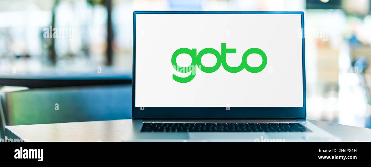 POZNAN, POL - JUN 28, 2022: Laptop computer displaying logo of PT GoTo ...