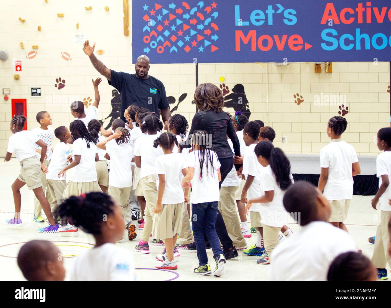 First lady Michelle Obama and NBA basketball great Shaquille O'Neal ...