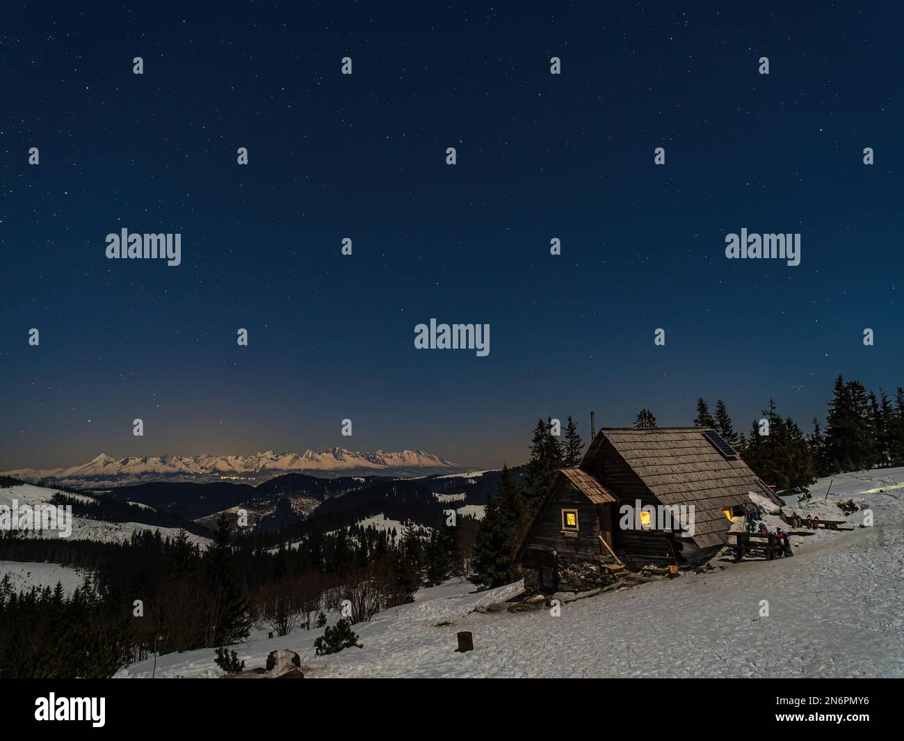 Mountain hut Andrejcova in Low Tatras Slovakia under a starry sky ...