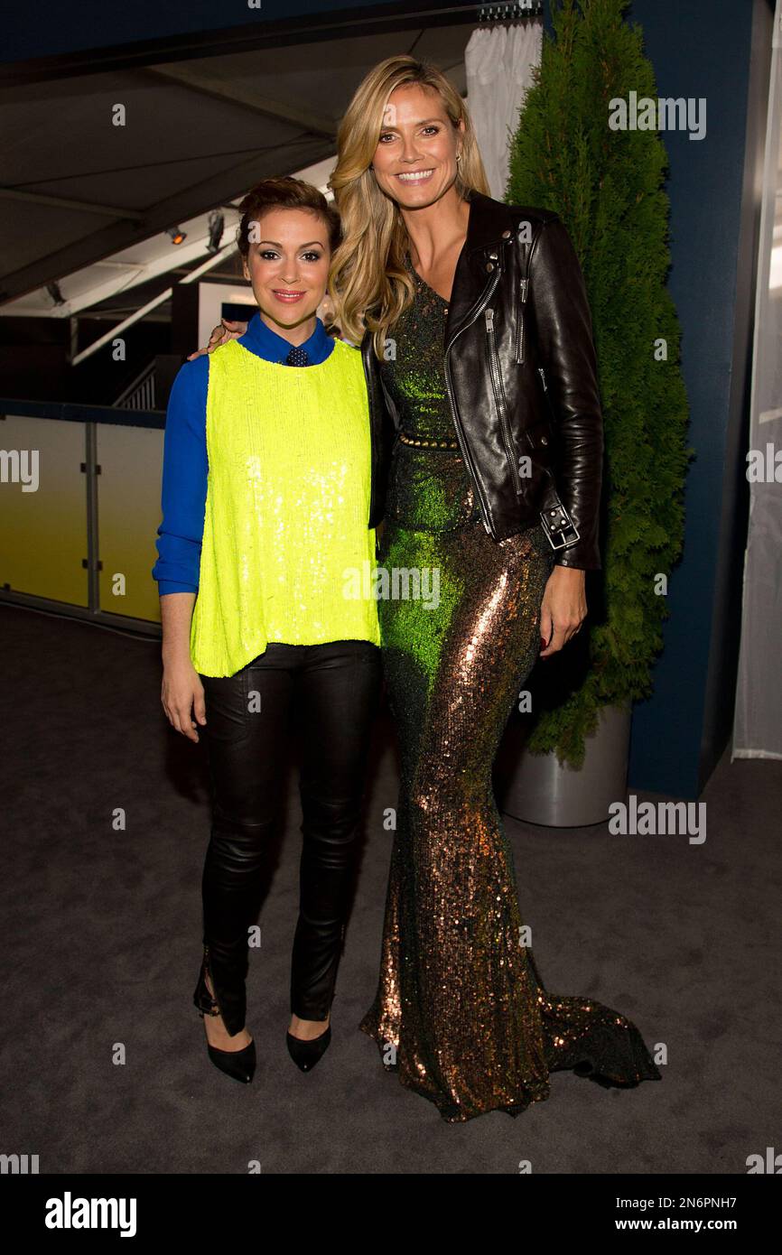Actress Alyssa Milano, left, and model/host Heidi Klum attend the ...
