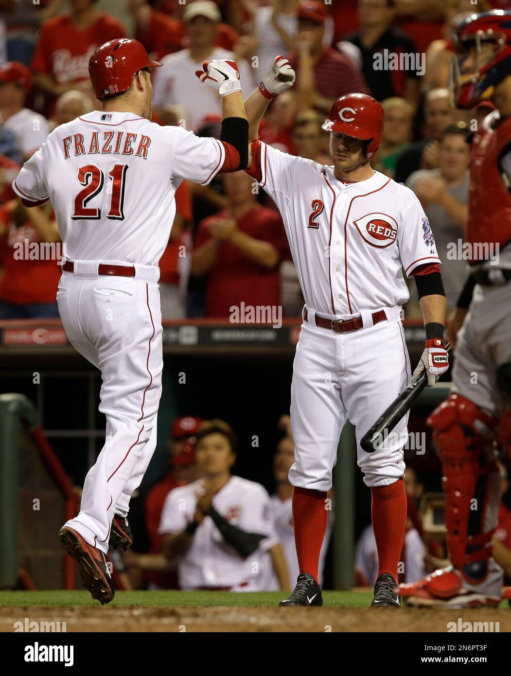 Cincinnati Reds' Todd Frazier (21) is congratulated by Zack Cozart (2 ...