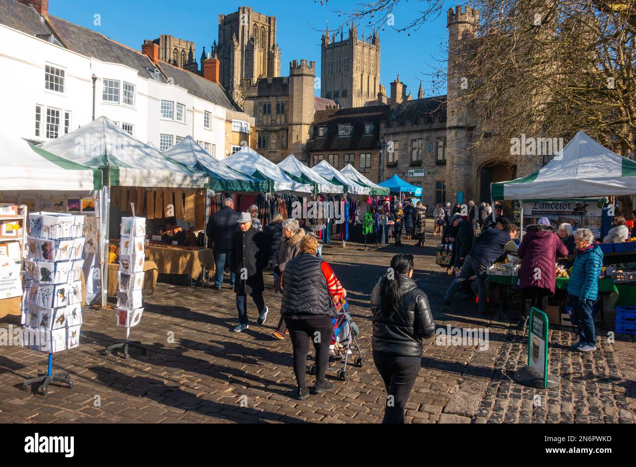 Market Day in the market square at Wells, Somerset with the Cathedral ...