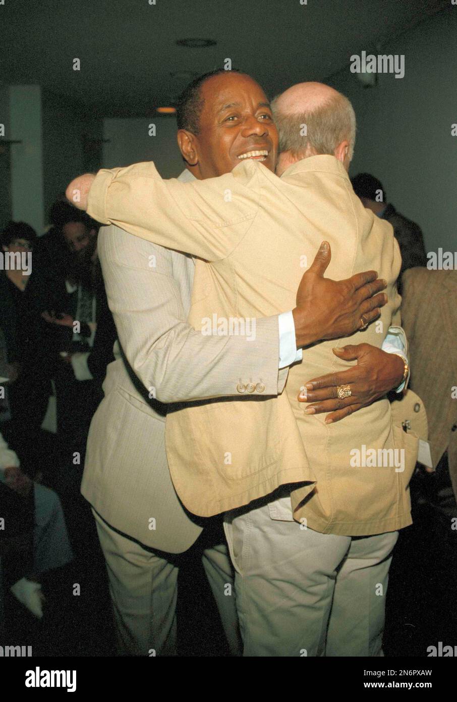 Flip Wilson hugs Tim Kiley, director of "The Flip Wilson Show" at the ...