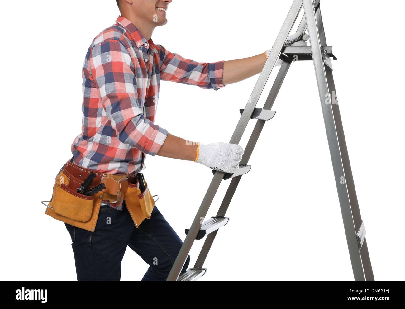 Professional constructor climbing ladder on white background, closeup ...