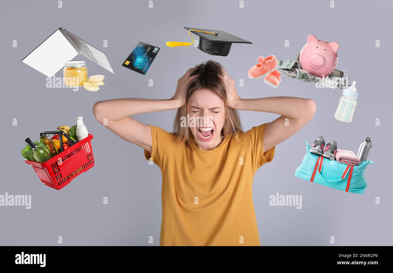 Overwhelmed woman and different objects around her on light grey ...