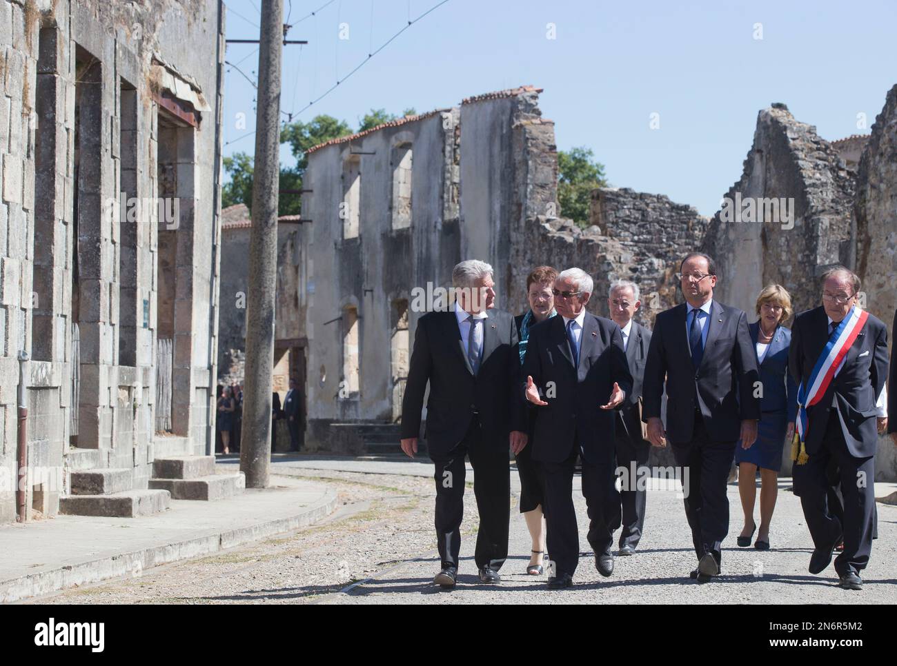 From left, German President Joachim Gauck, Robert Hebras, one of the ...