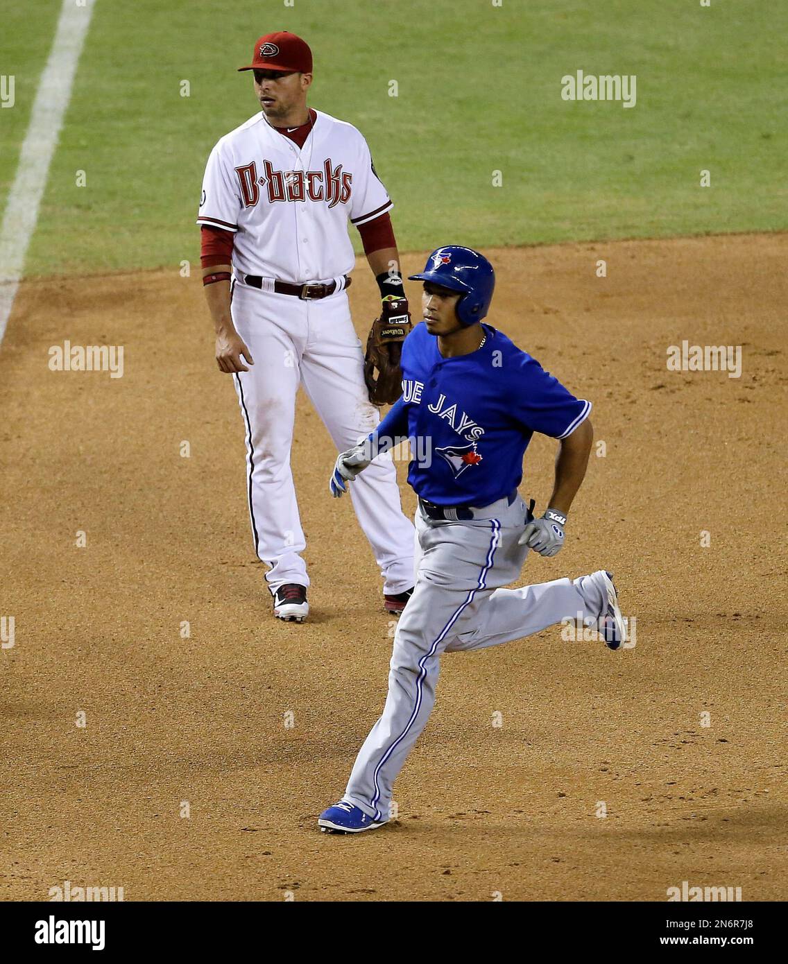 Toronto Blue Jays' Moises Sierra rounds the bases in front of Arizona ...