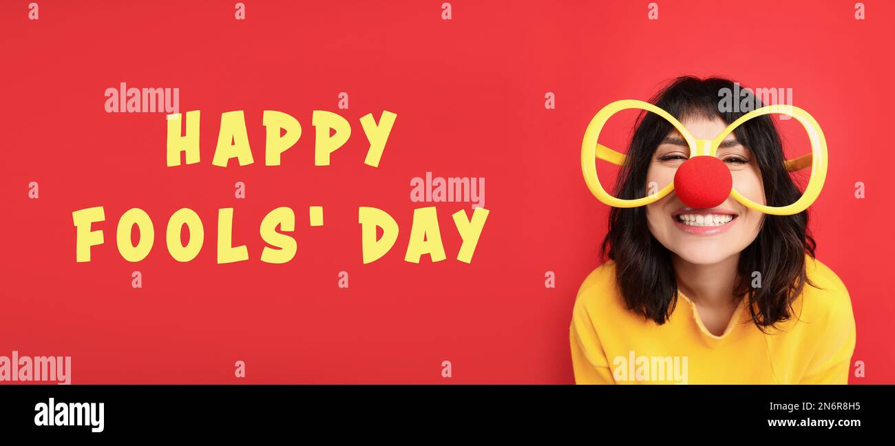 Funny woman with large glasses and clown nose on red background, banner ...