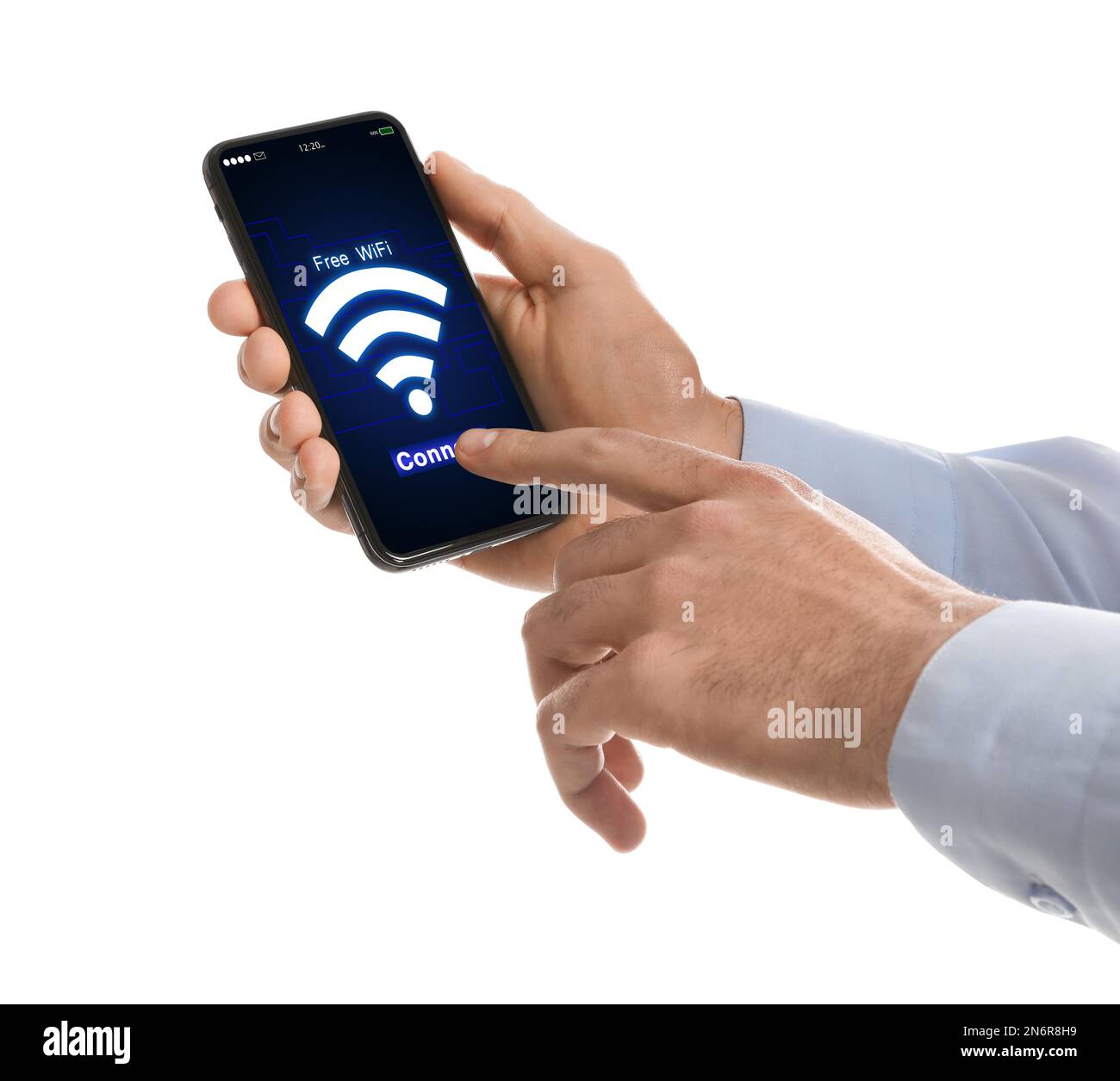Man connecting to WiFi using mobile phone on white background, closeup ...