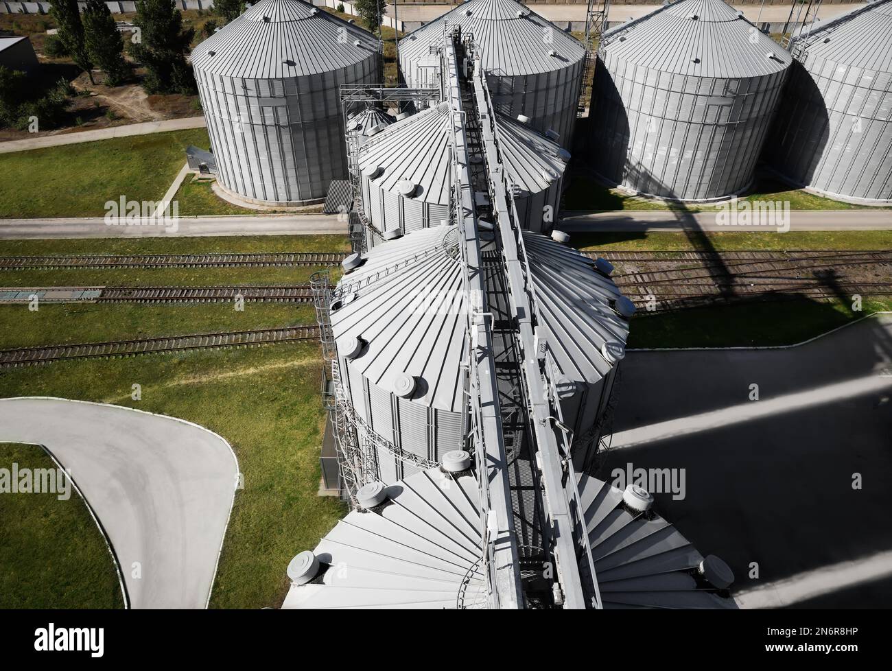 View of modern granaries for storing cereal grains outdoors Stock Photo ...