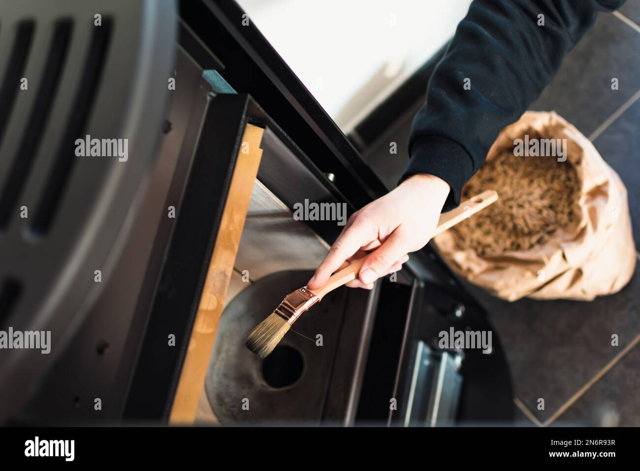 Clean the pellet stove hi-res stock photography and images - Alamy