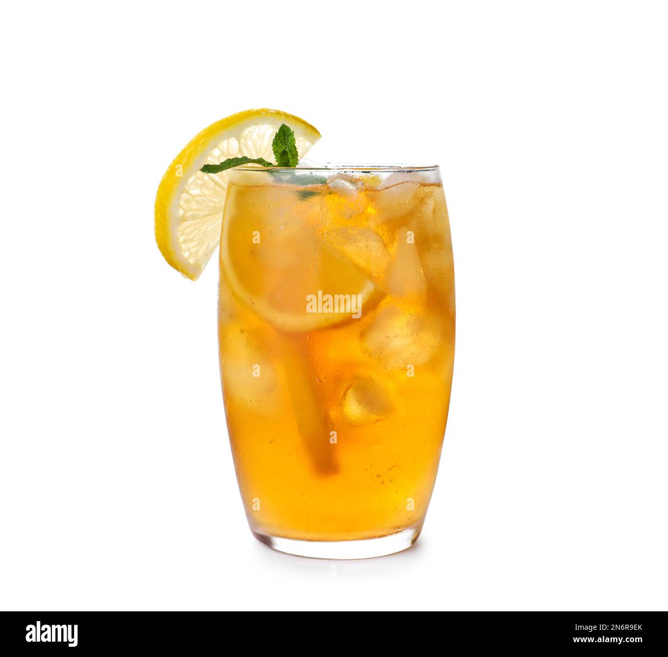 Delicious iced tea in glass on white background Stock Photo - Alamy