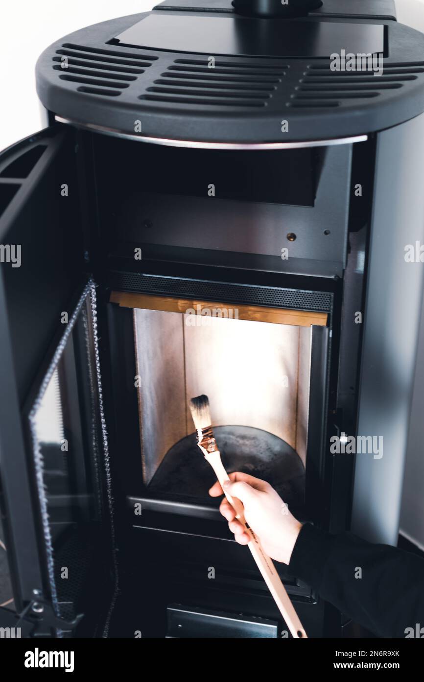 Clean the pellet stove hi-res stock photography and images - Alamy