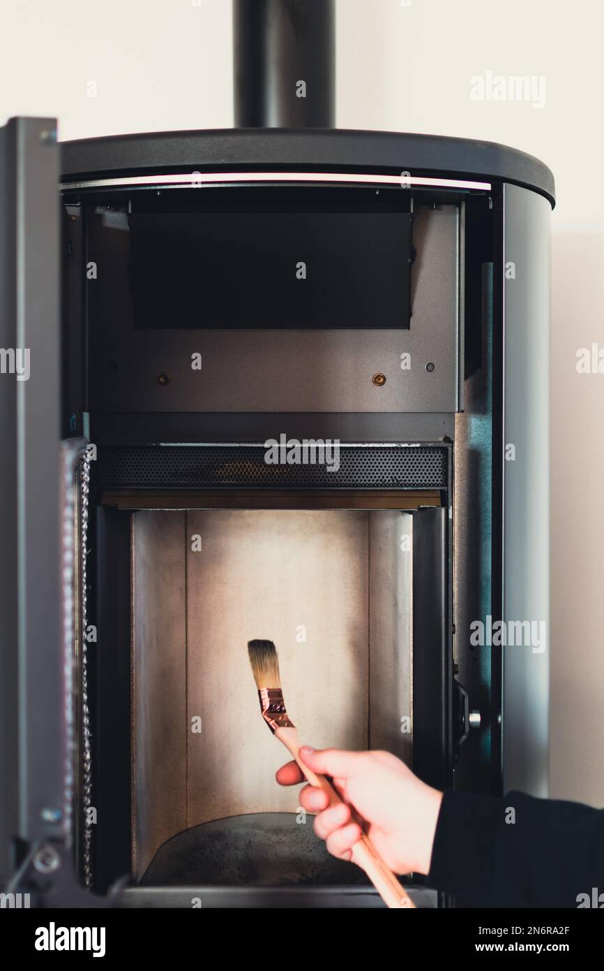 Clean the pellet stove hi-res stock photography and images - Alamy