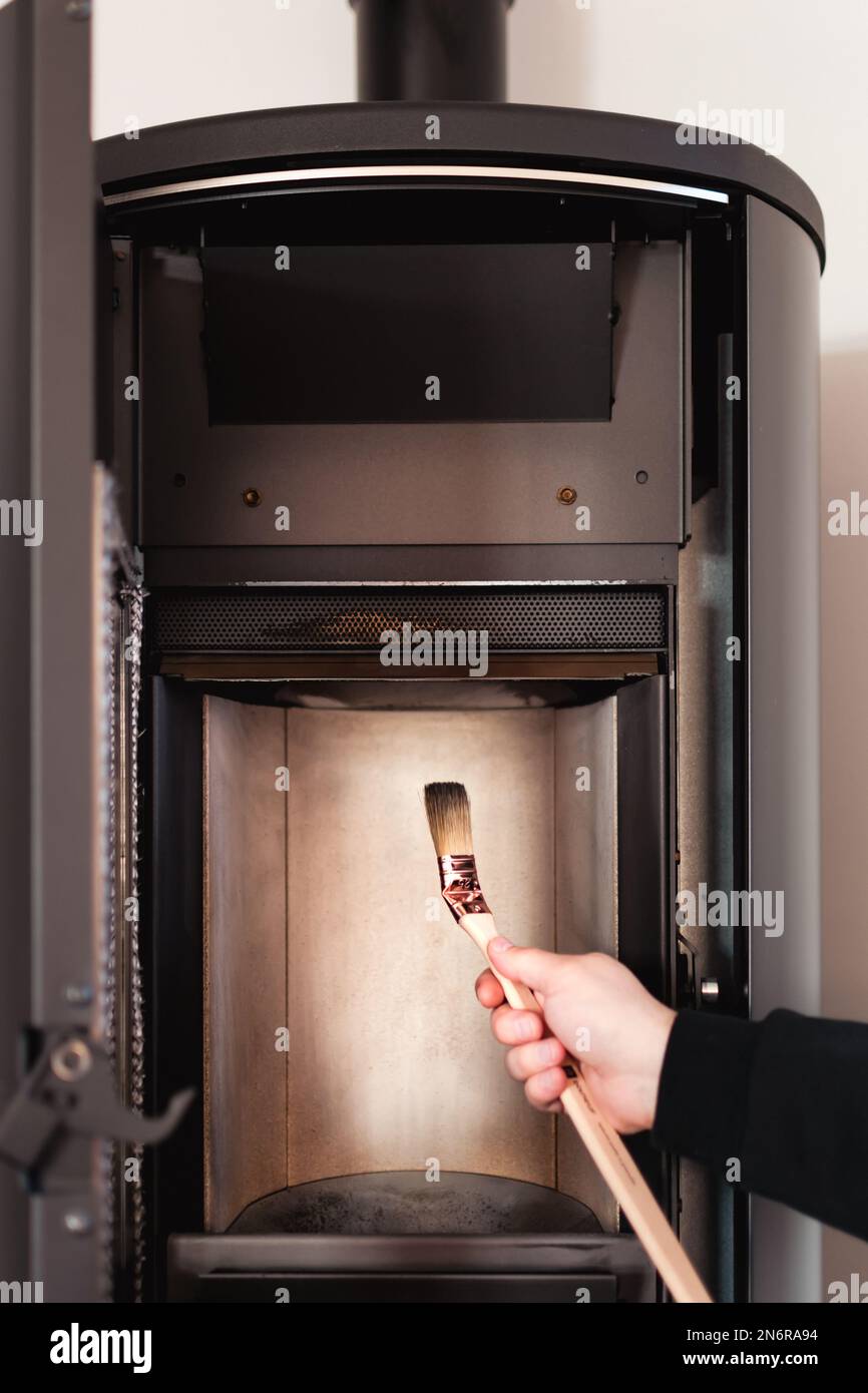 Clean the pellet stove hi-res stock photography and images - Alamy