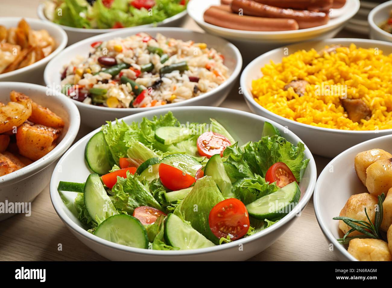 Different delicious dishes on table, closeup. Buffet service Stock ...