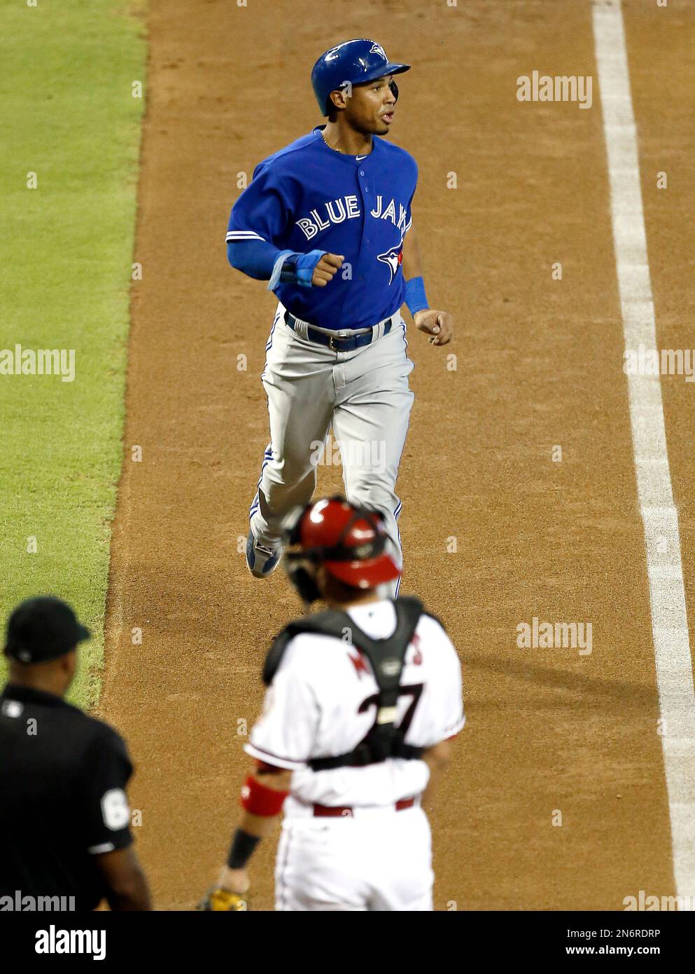 Toronto Blue Jays' Moises Sierra scores on an RBI base hit by teammate ...