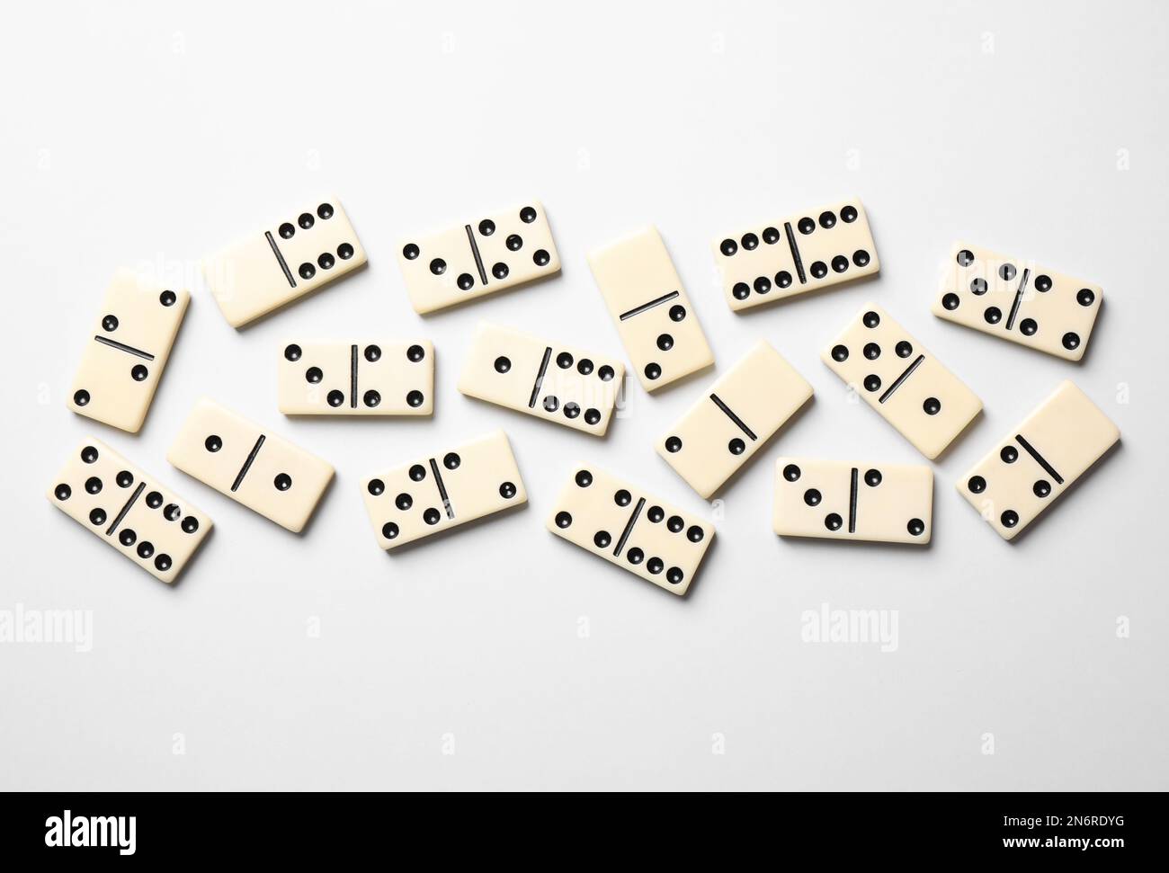 Classic domino tiles on white background, flat lay Stock Photo - Alamy