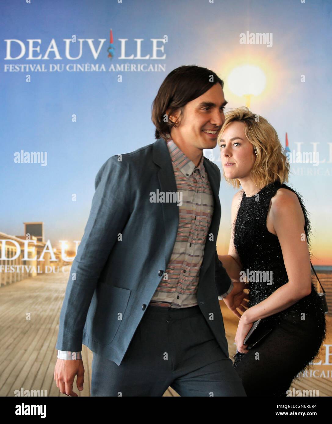 Director M. Blash, left, and actress Jena Malone pose during a photo ...