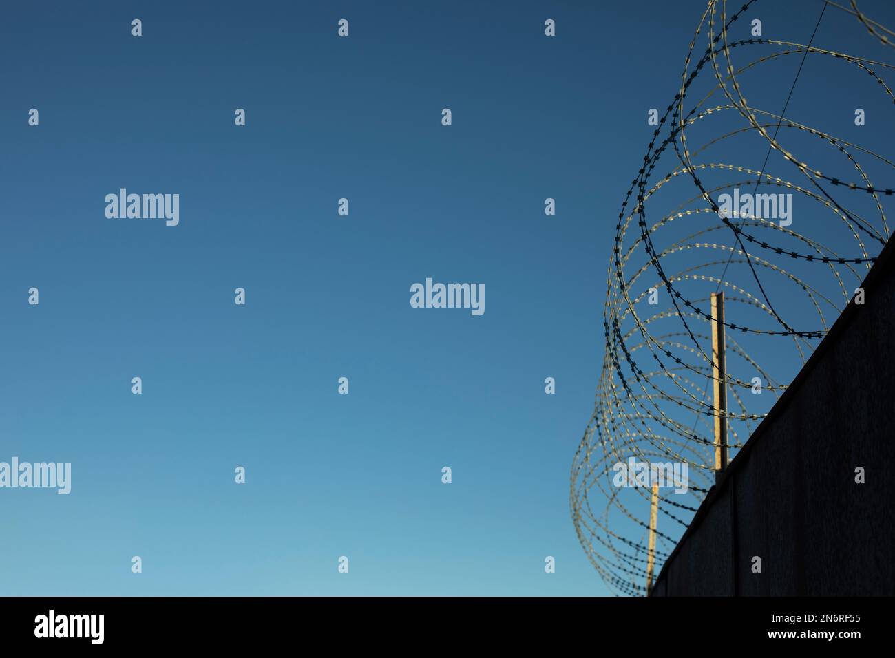 Barbed wire fence. Details of industrial area. Protection made of ...