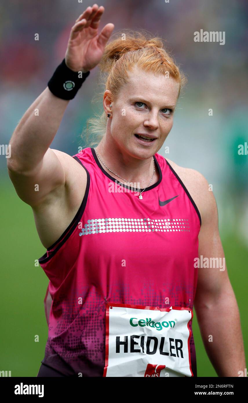Betty Heidler from Germany waves during the women's hammer throw ...