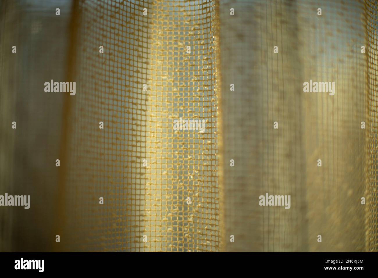 Curtains on window. Light through curtains. Fabric texture. structure ...