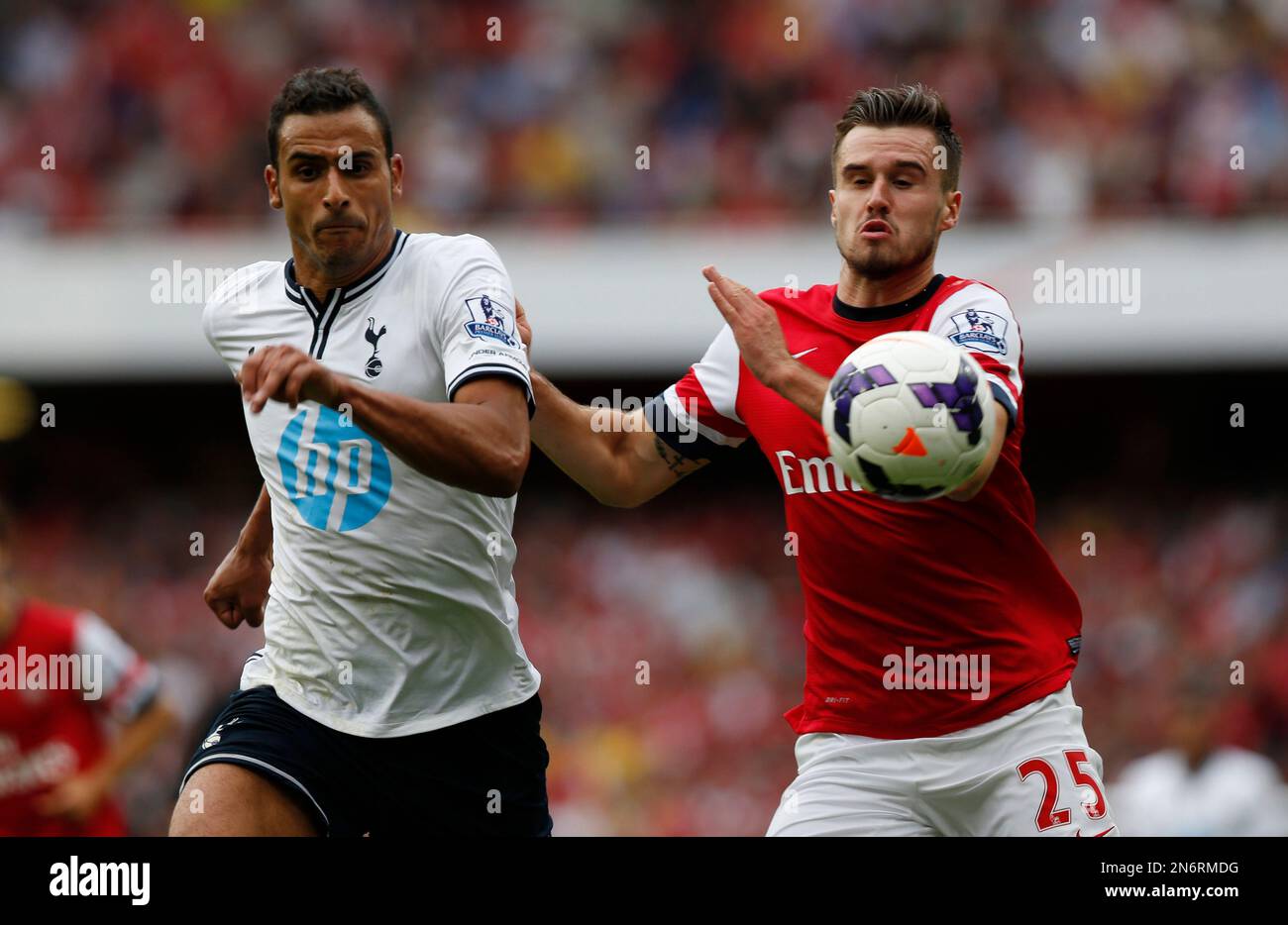 Arsenal's Carl Jenkinson, right, competes with Tottenham Hotspur's ...