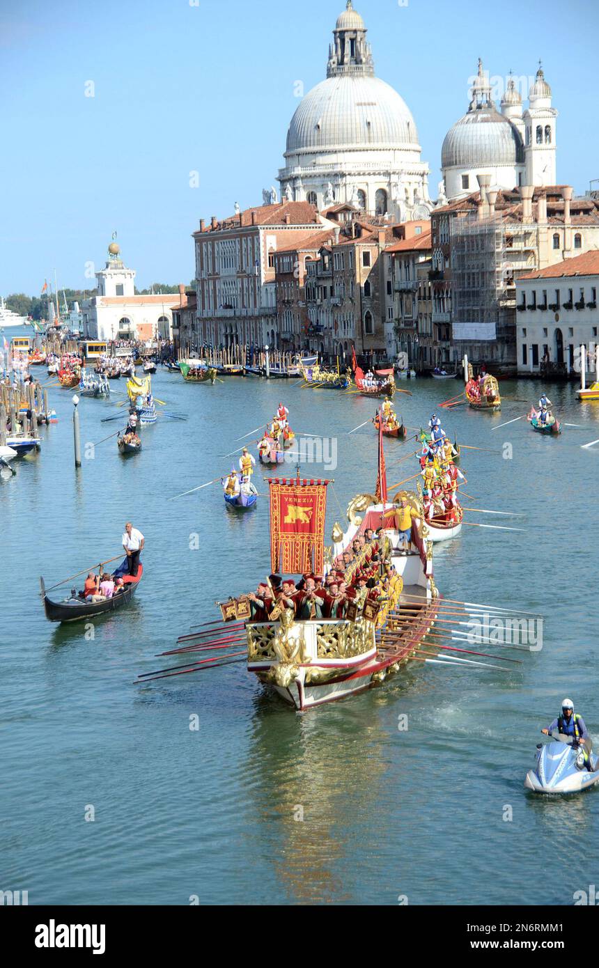 The Bucintoro, foreground, the barge of Venice's ruler, the Doge, sails ...