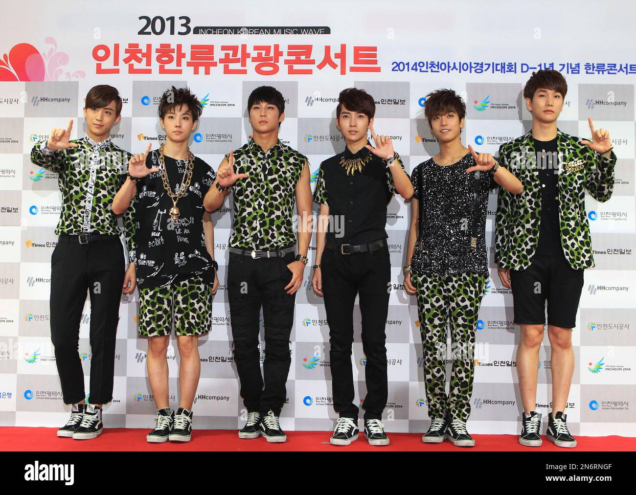 South Korean K-Pop boy group A-JAX poses for photographers during a ...
