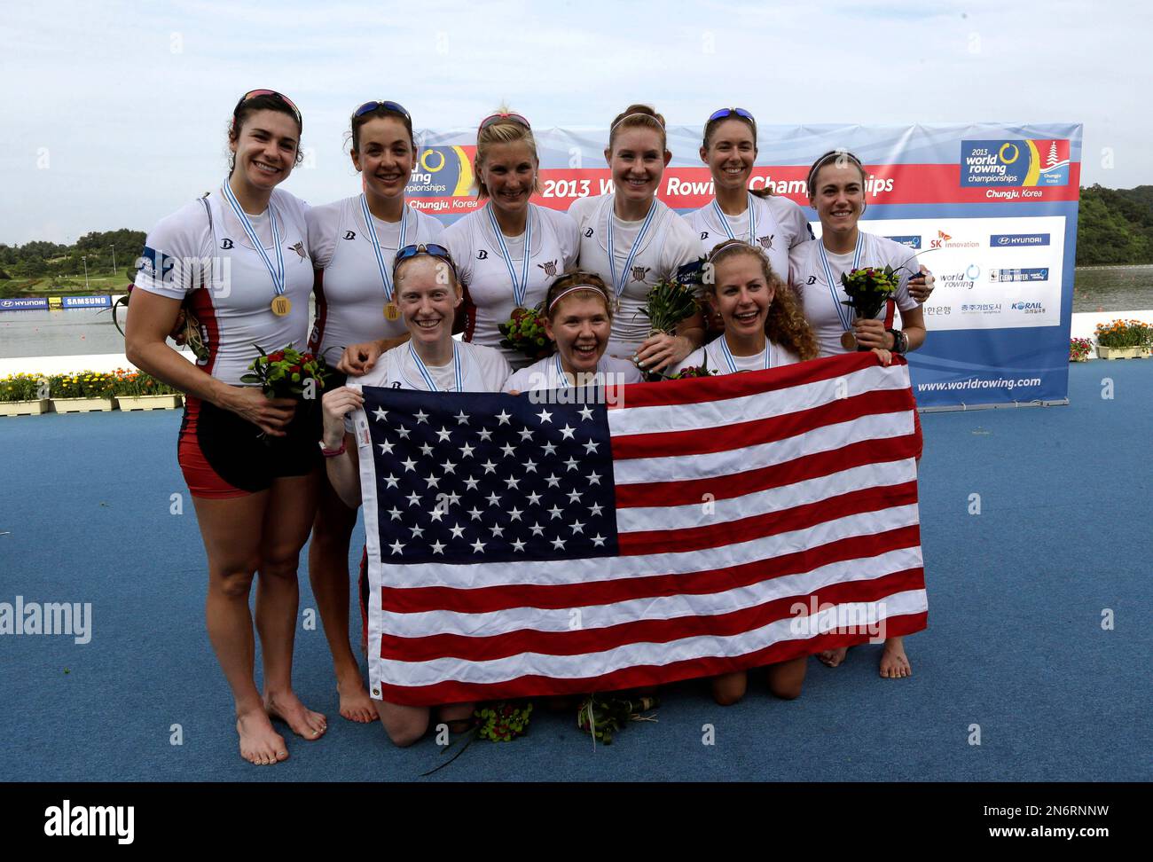 U.S. rowers pose for the media during a medal ceremony for the women's ...