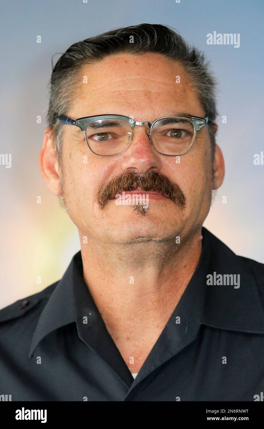 Actor Mark Burnham poses during a photocall for his film "Wrong Cops ...
