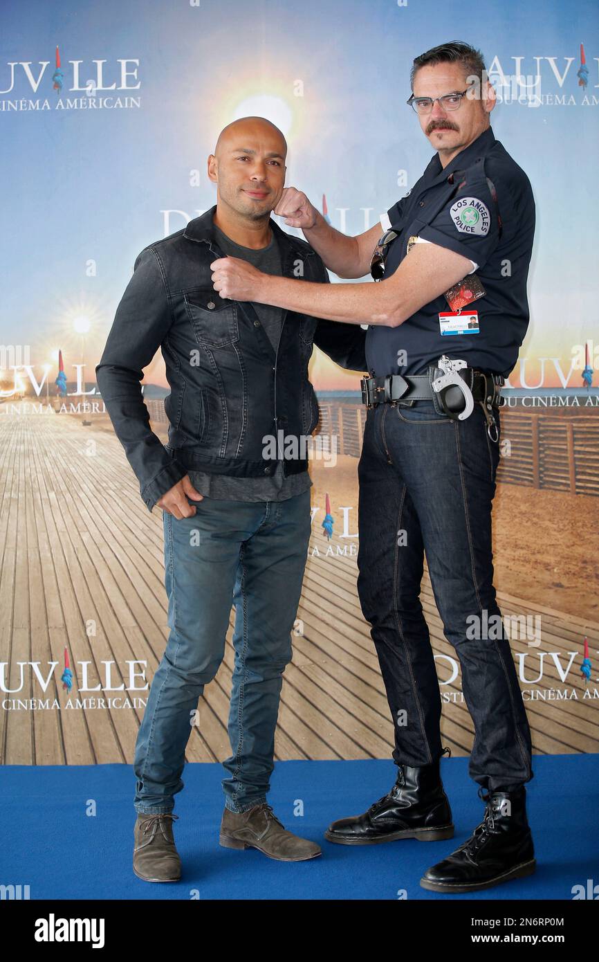 Actors Mark Burnham, right, and Eric Judor pose for photographers ...