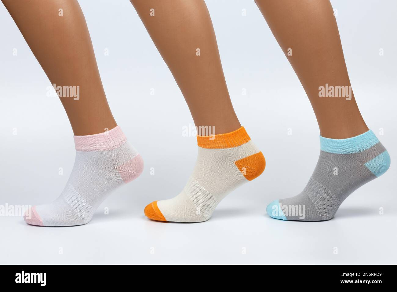 Socks on the leg. Socks on a white background Stock Photo - Alamy
