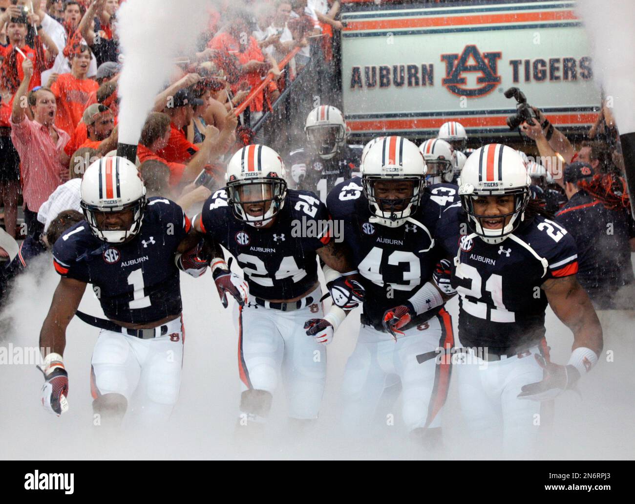Auburn wide receiver Trovon Reed (1), Auburn defensive back Ryan Smith ...