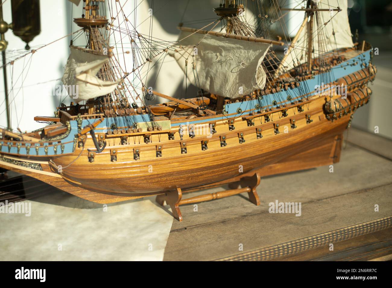 Small ship. Model of frigate. Sails on wooden ship. Masts on deck Stock ...