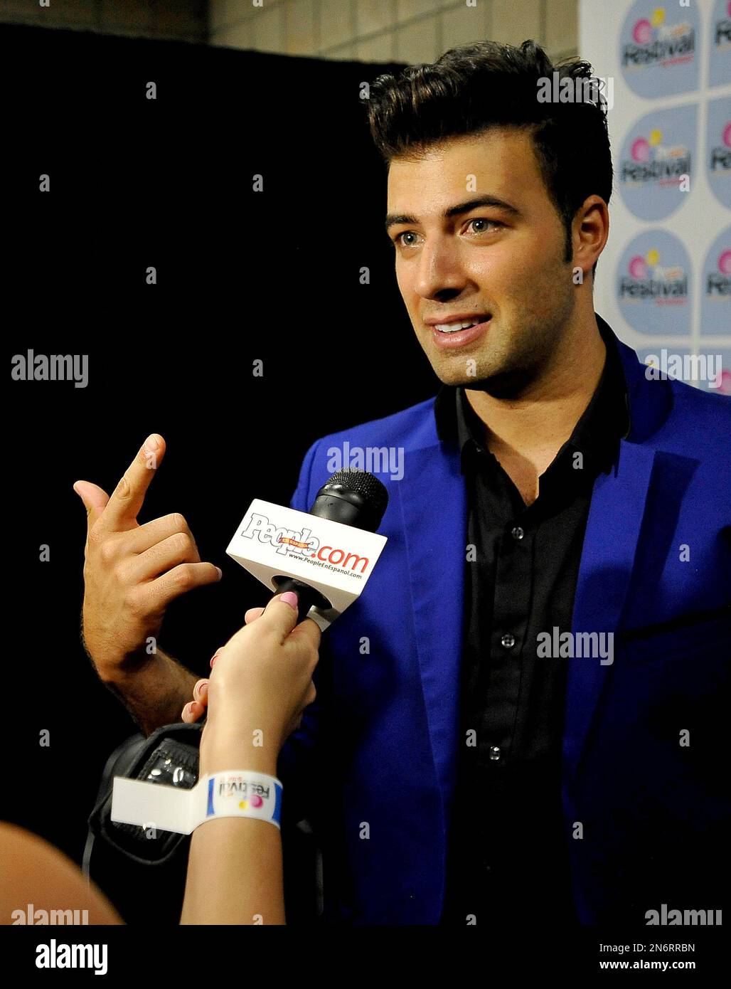 Singer Jencarlos Canela backstage at Festival People en Espanol 2013 ...