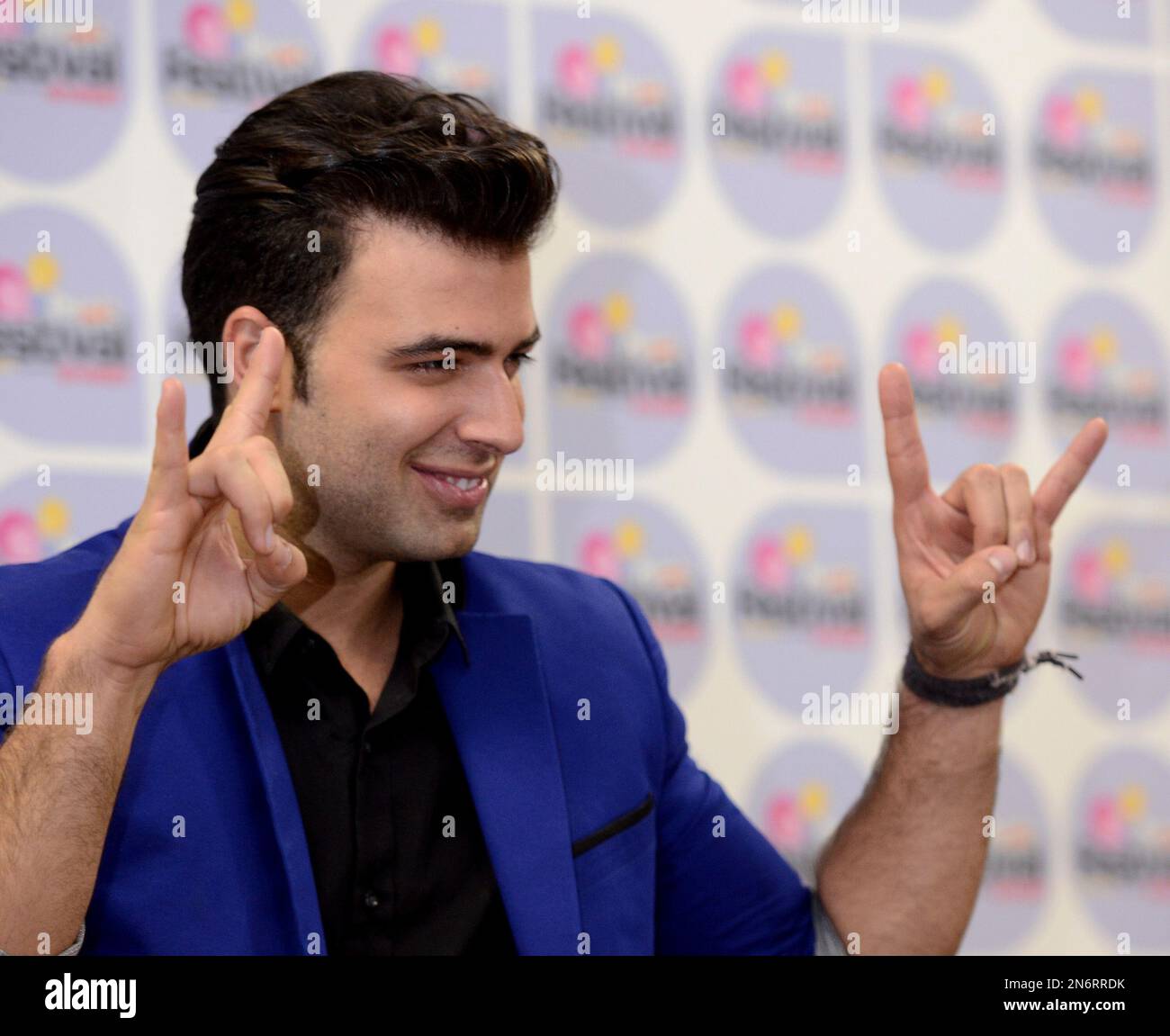Singer Jencarlos Canela backstage at Festival People en Espanol 2013 ...