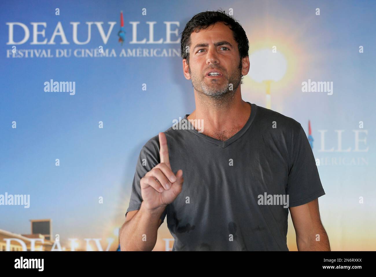 Director David Rosenthal gestures as he poses during a photocall for ...