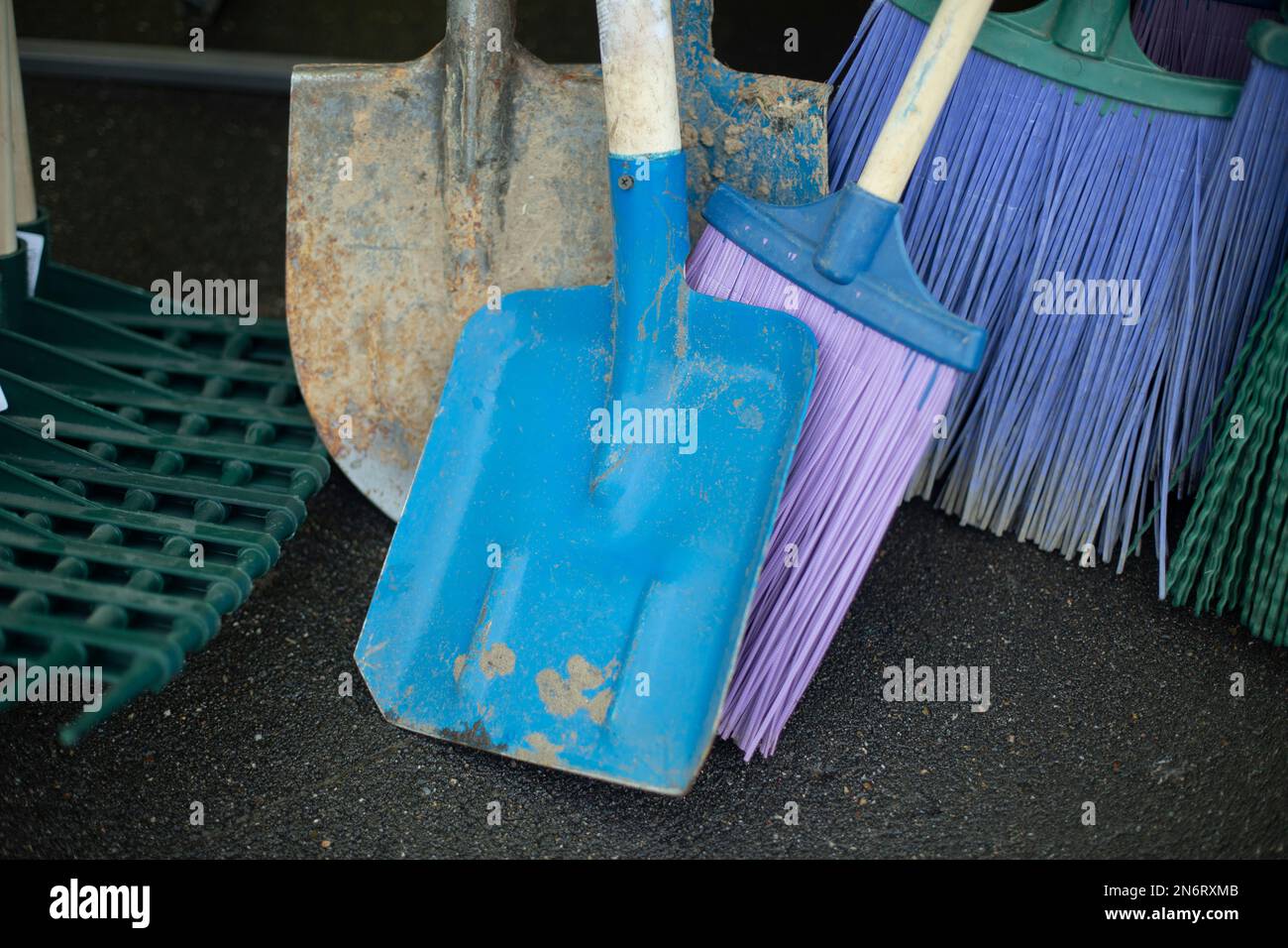Broom for cleaning. Garden tools for leaf harvesting. Cleaning brushes ...