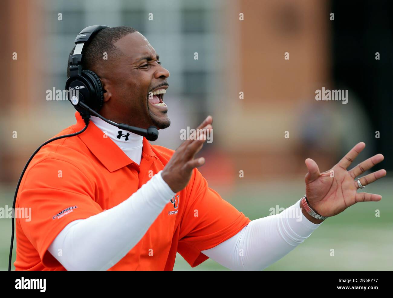 Campbell head coach Mike Minter directs his team against the Charlotte ...