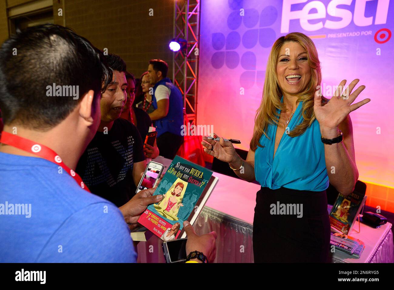 Maria Marin signs autographs at Festival People en Espanol 2013, on ...