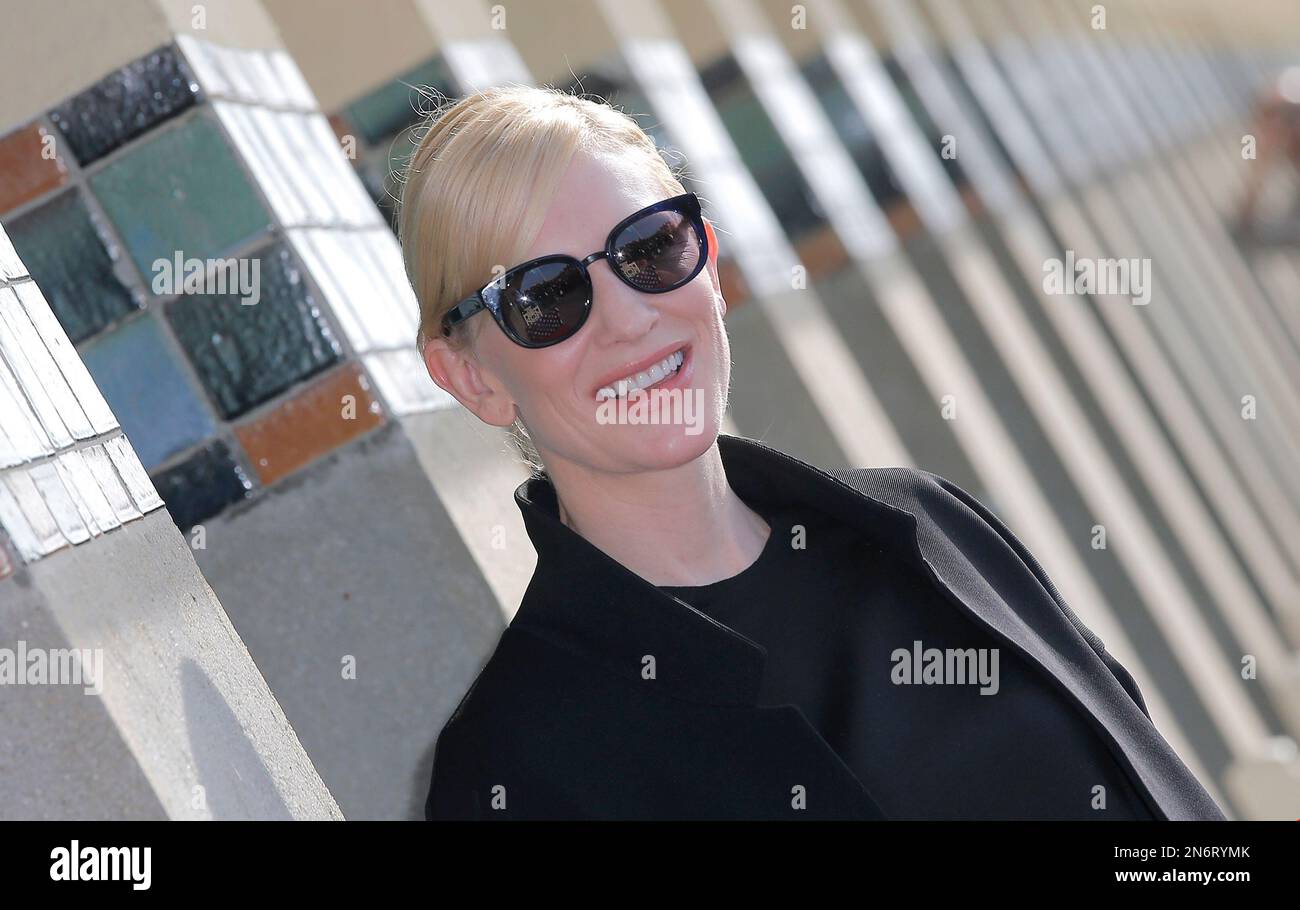 Cate Blanchett poses in front of beach huts at the Deauville promenade ...