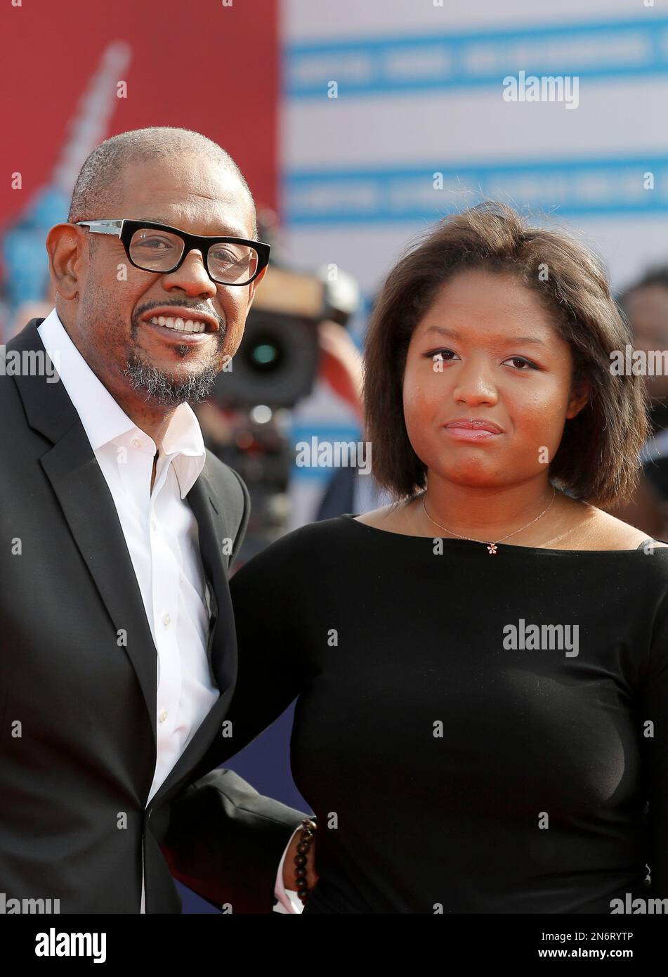 Actor Forest Whitaker, left, and his daughter Sonnet arrive for the ...