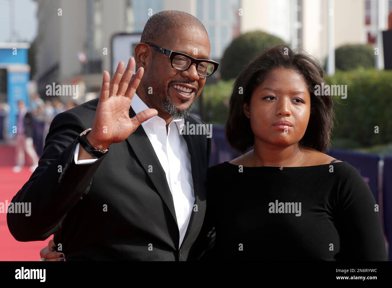 Actor Forest Whitaker, left, and his daughter Sonnet arrive for the ...