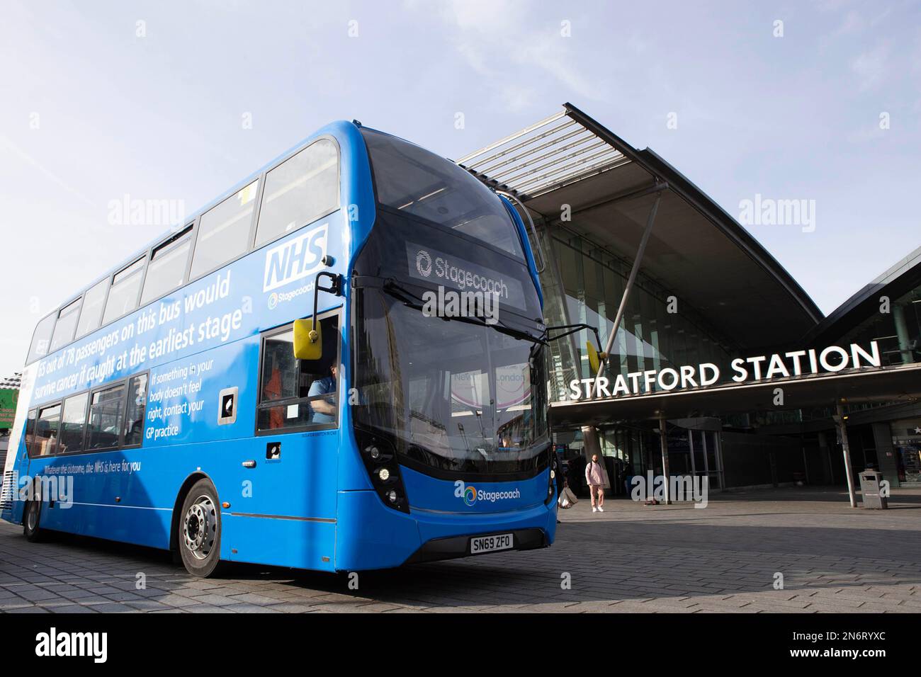 EDITORIAL USE ONLY The 'NHS Bus-ting Cancer' bus outside Stratford ...