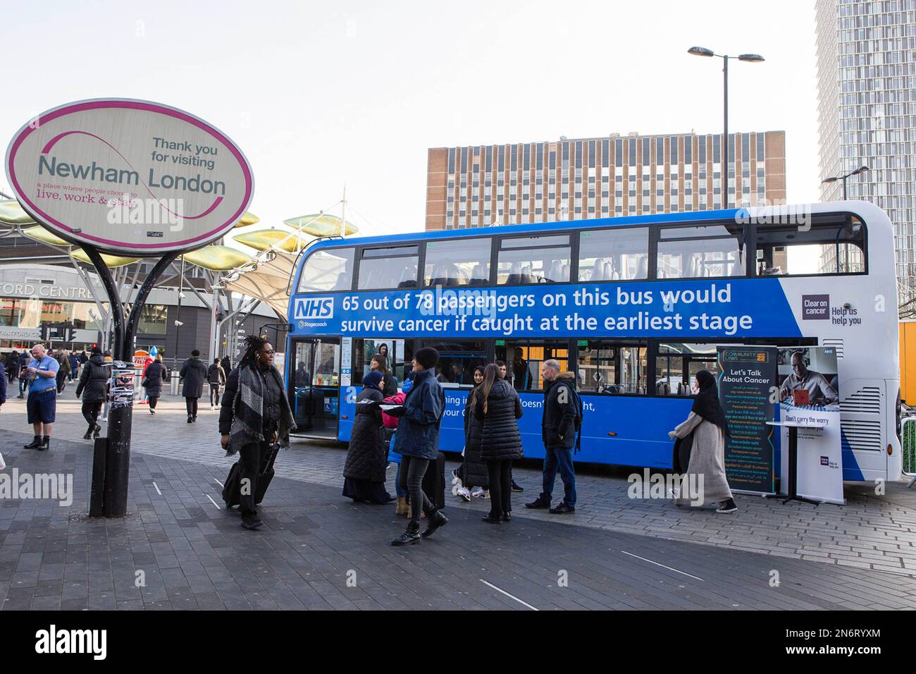 EDITORIAL USE ONLY Volunteers hand out leaflets in London as part of ...