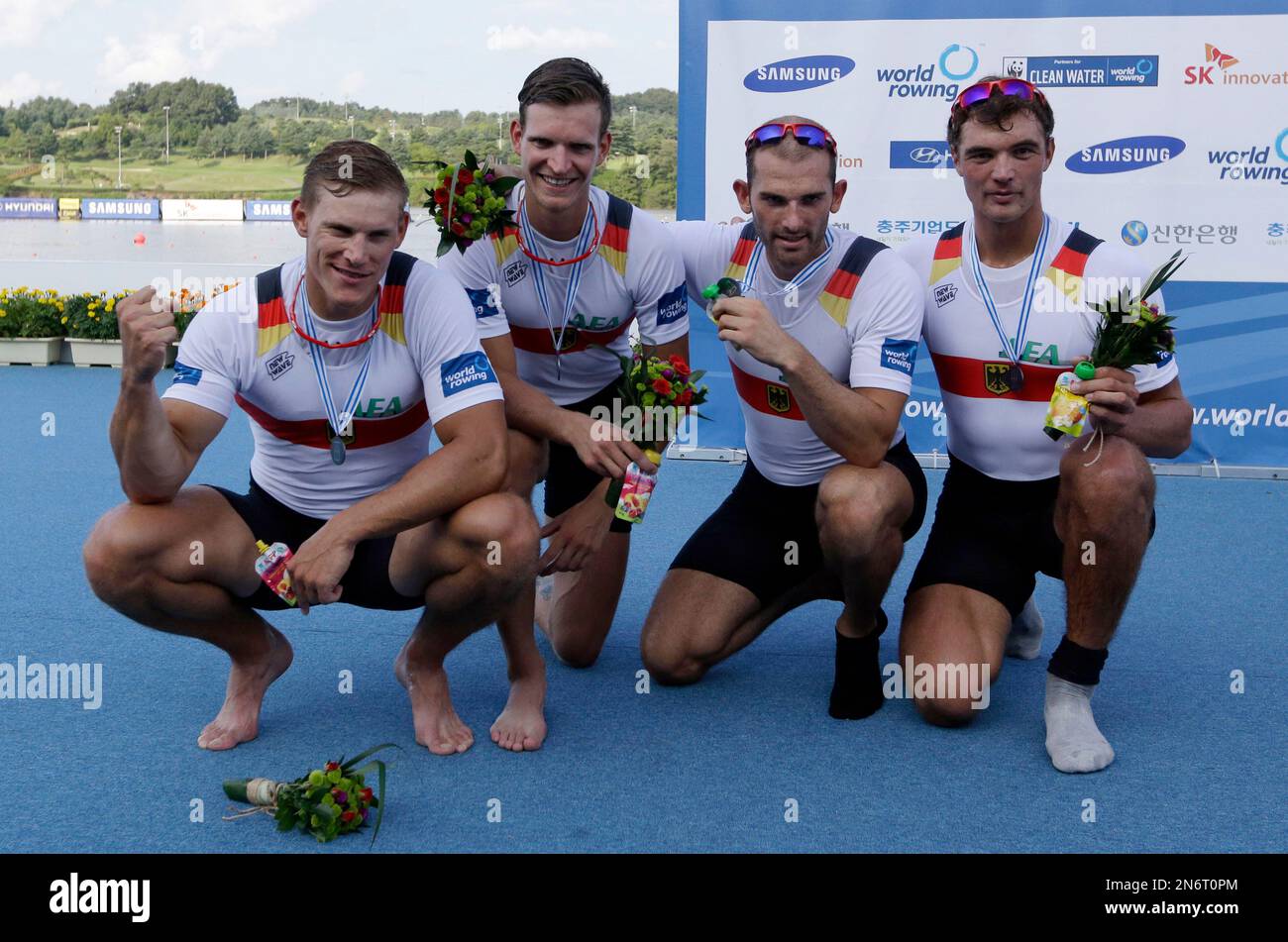 Winners for silver medals from Germany pose for the medal during medal ...