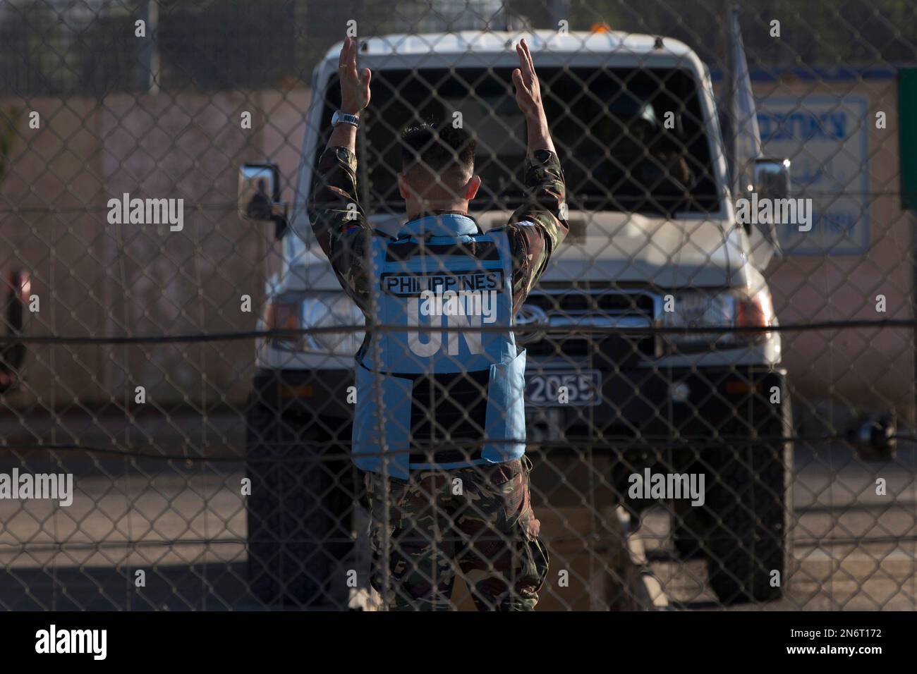 A U.N. peacekeeper from the Philippines UNDOF force works at the ...