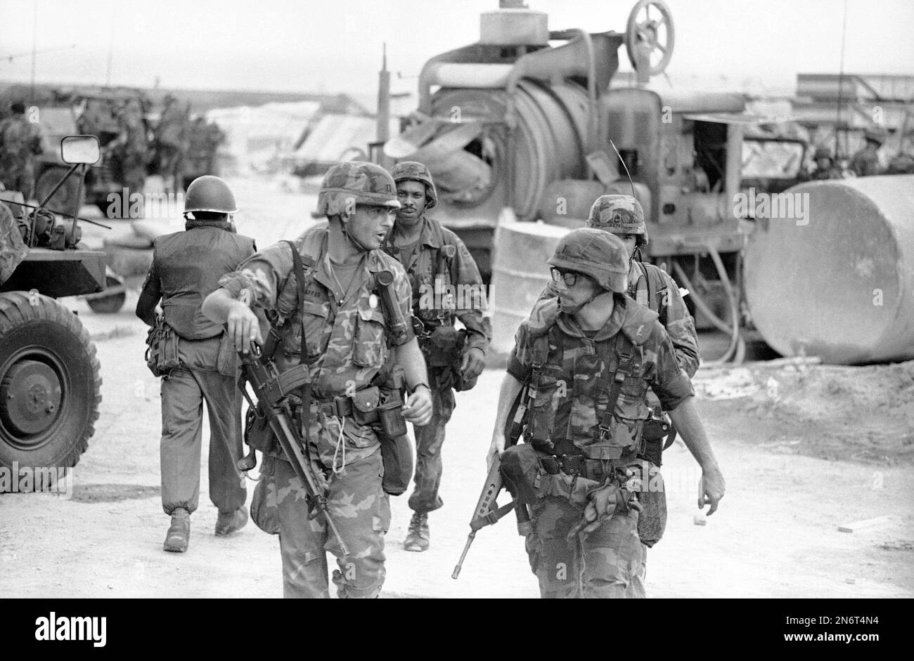 FILE - This Oct. 27, 1983 black-and-white file photo shows two officers ...