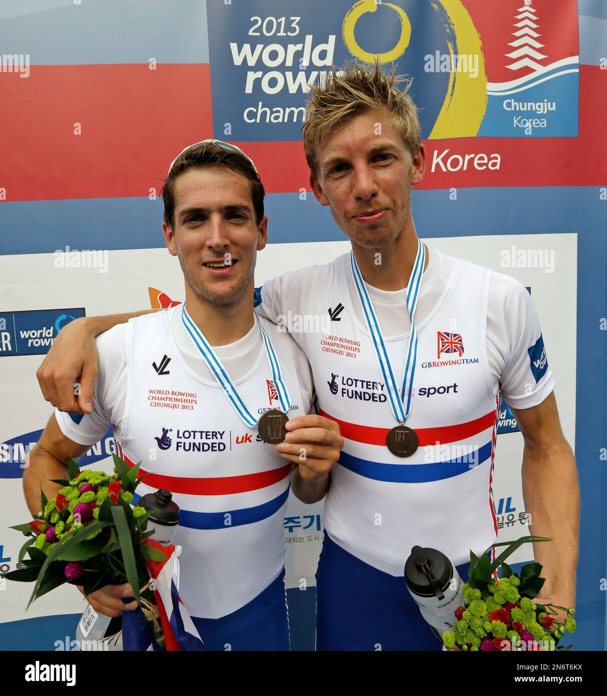 Britain's bronze medalists Sam Scrimgeour, left, and Mark Aldred pose ...